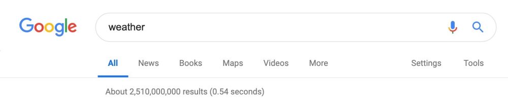 Google testing 'Search' button, colorful magnifying glass icon - 9to5Google